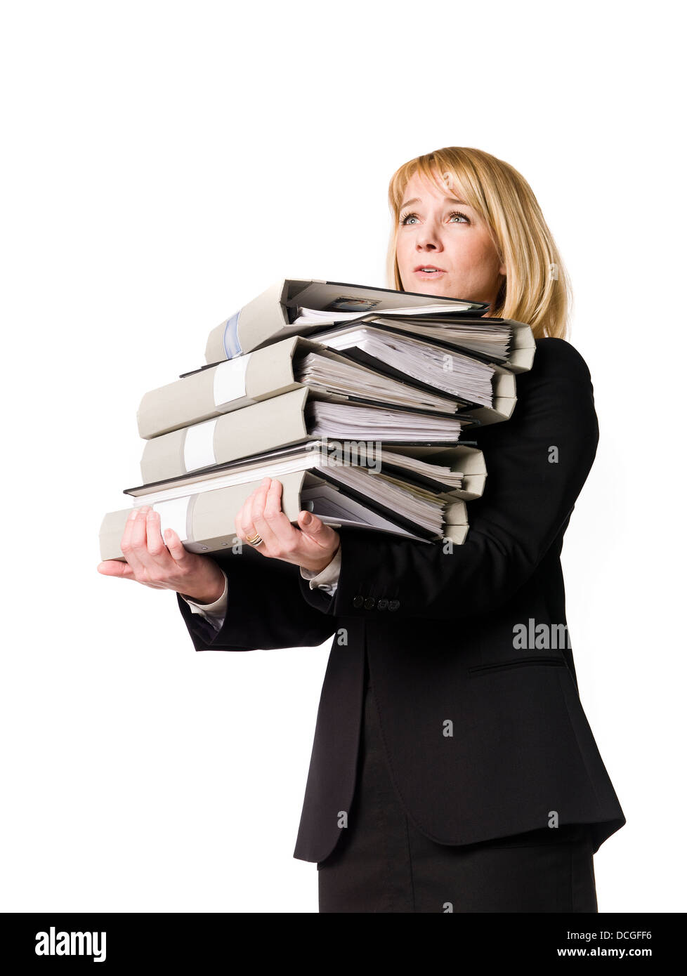 Woman overloaded with work Stock Photo - Alamy