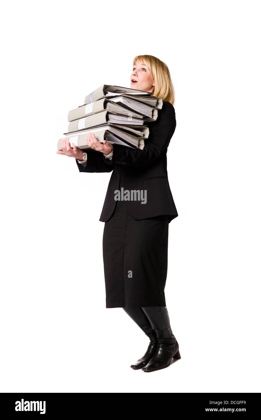 Woman overloaded with work Stock Photo - Alamy