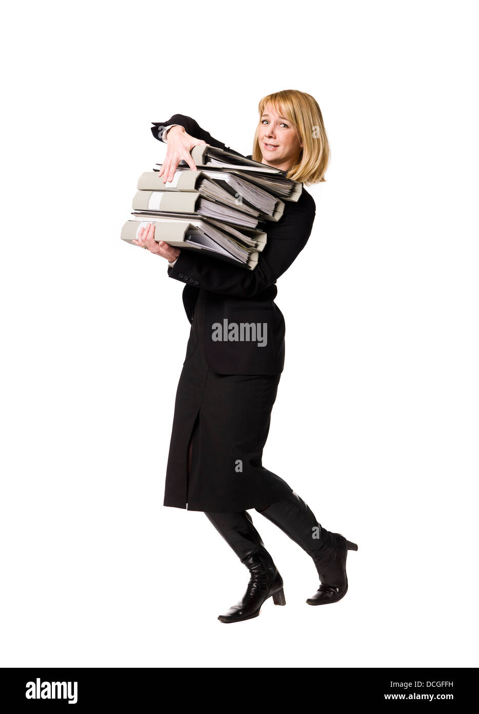 Woman overloaded with work Stock Photo - Alamy
