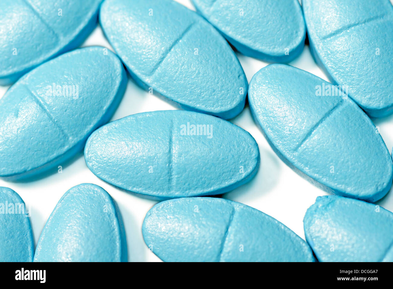 Blue pills background Stock Photo - Alamy