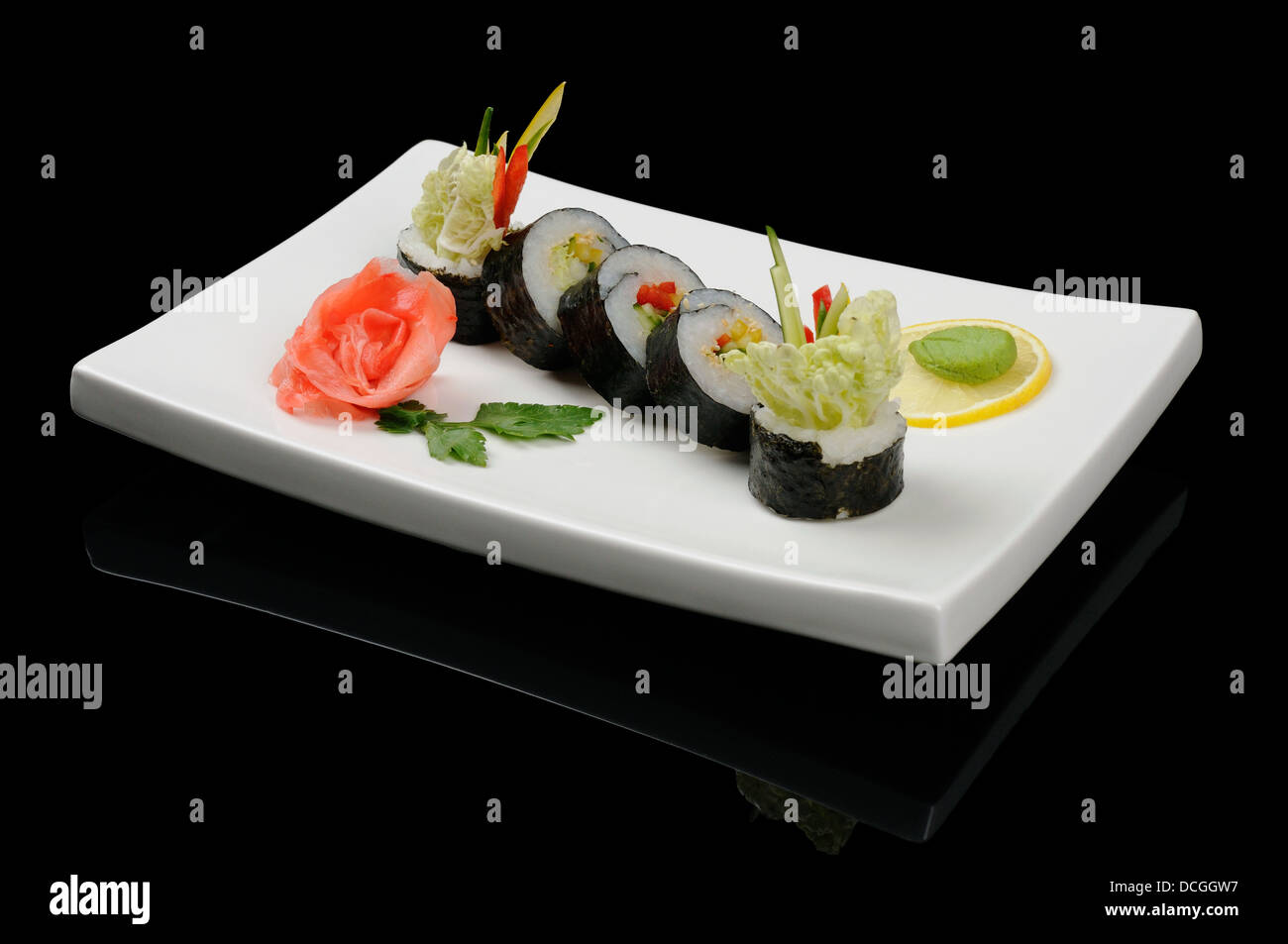 Five vegetable rolls served on white plate Stock Photo - Alamy