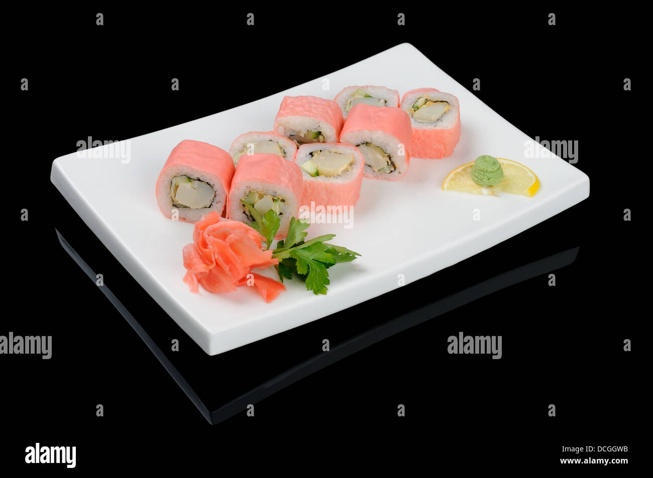 Eight pink soy paper rolls on white plate Stock Photo - Alamy