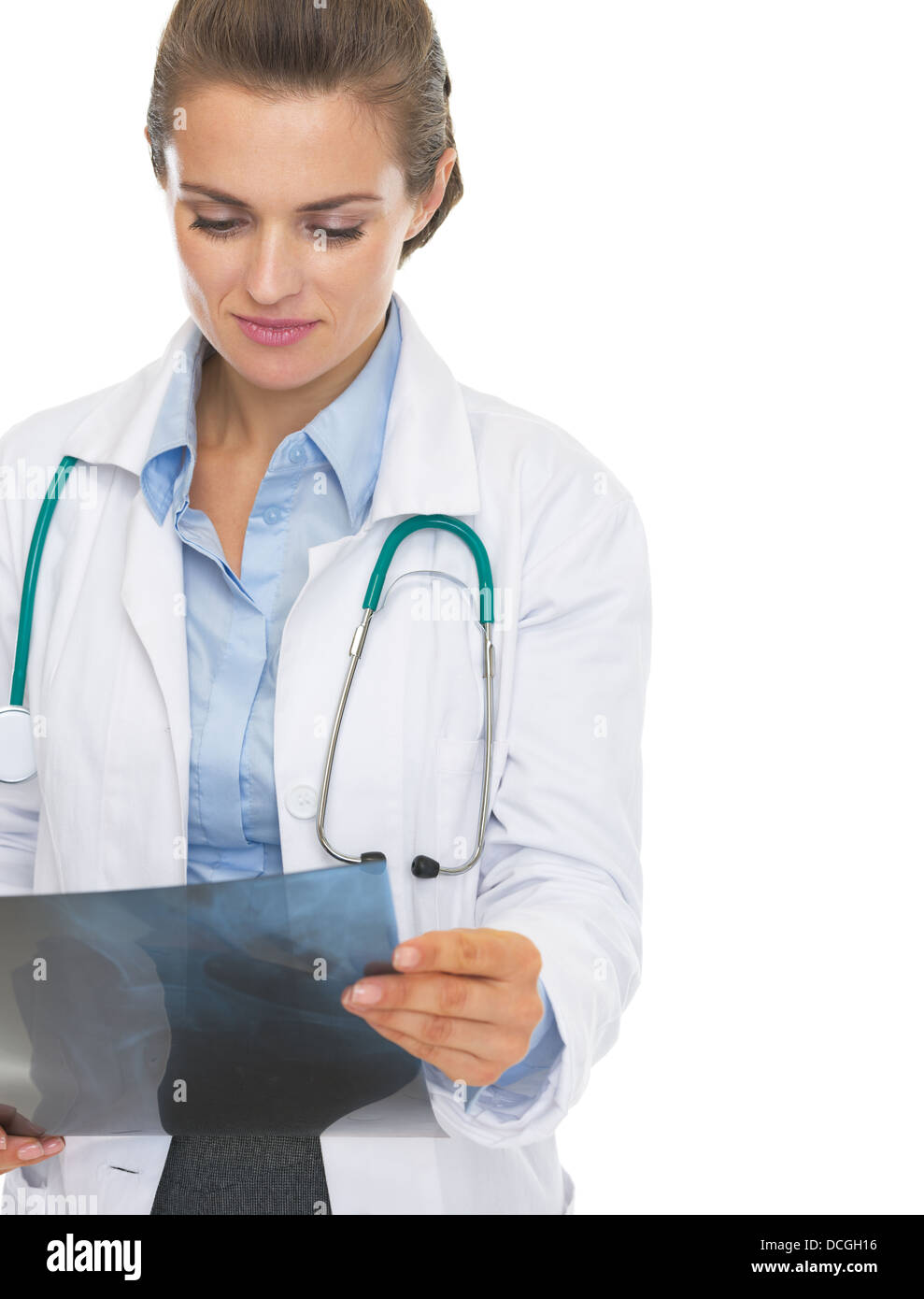 Thoughtful doctor woman checking fluorography Stock Photo - Alamy