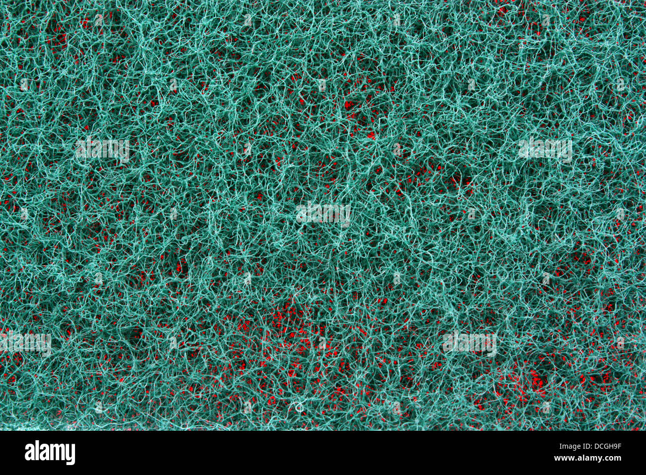 Translucent red color on green background Stock Photo - Alamy