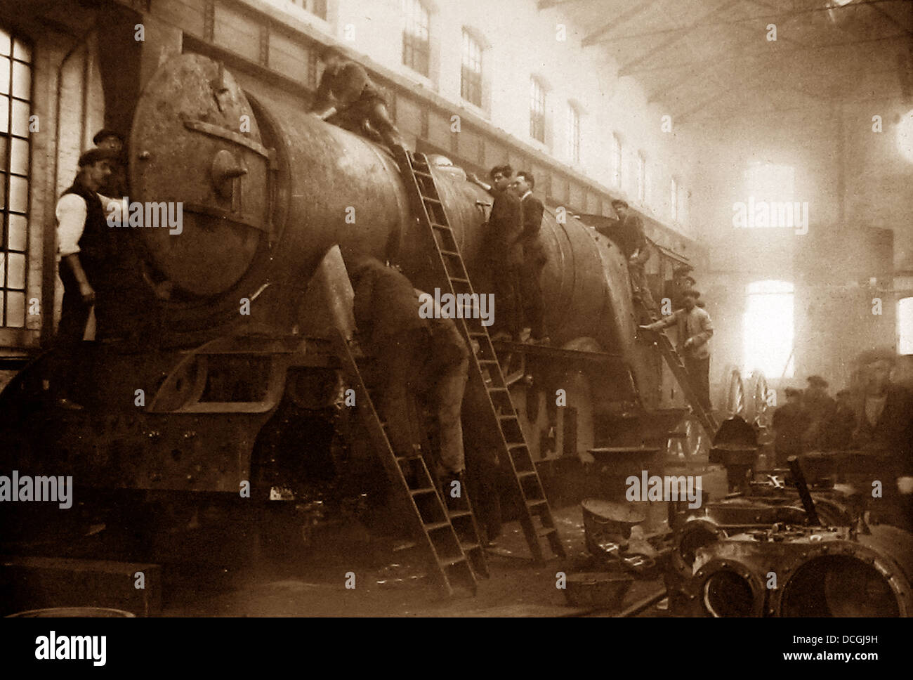 Building a steam engine boiler probably 1920s Stock Photo - Alamy