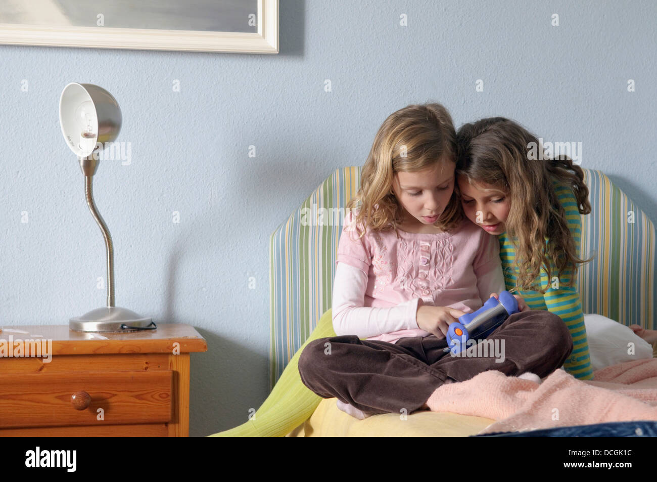 Two Girls Playing Together At Home Stock Photo - Alamy