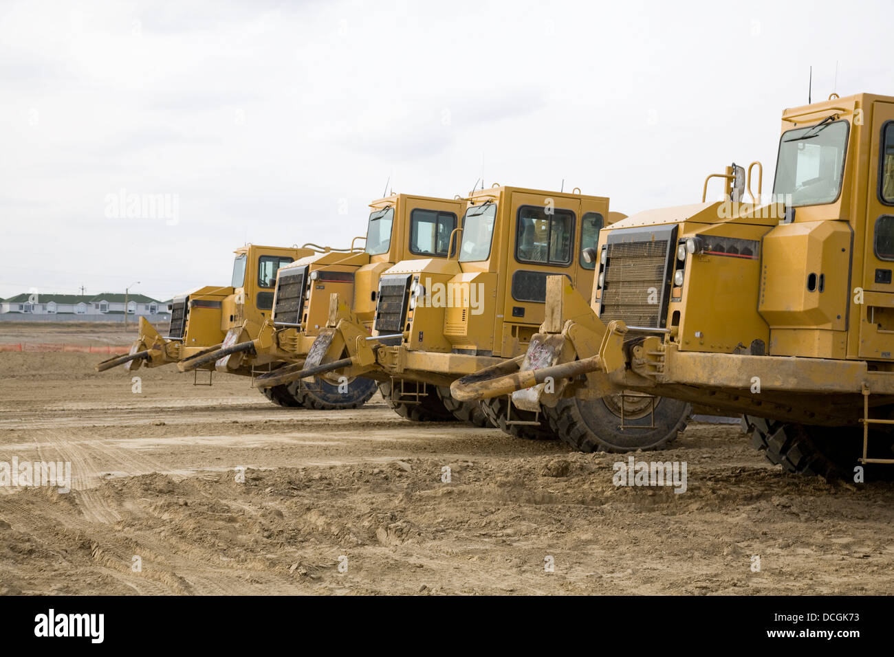 Row Of Construction Loaders Stock Photo - Alamy