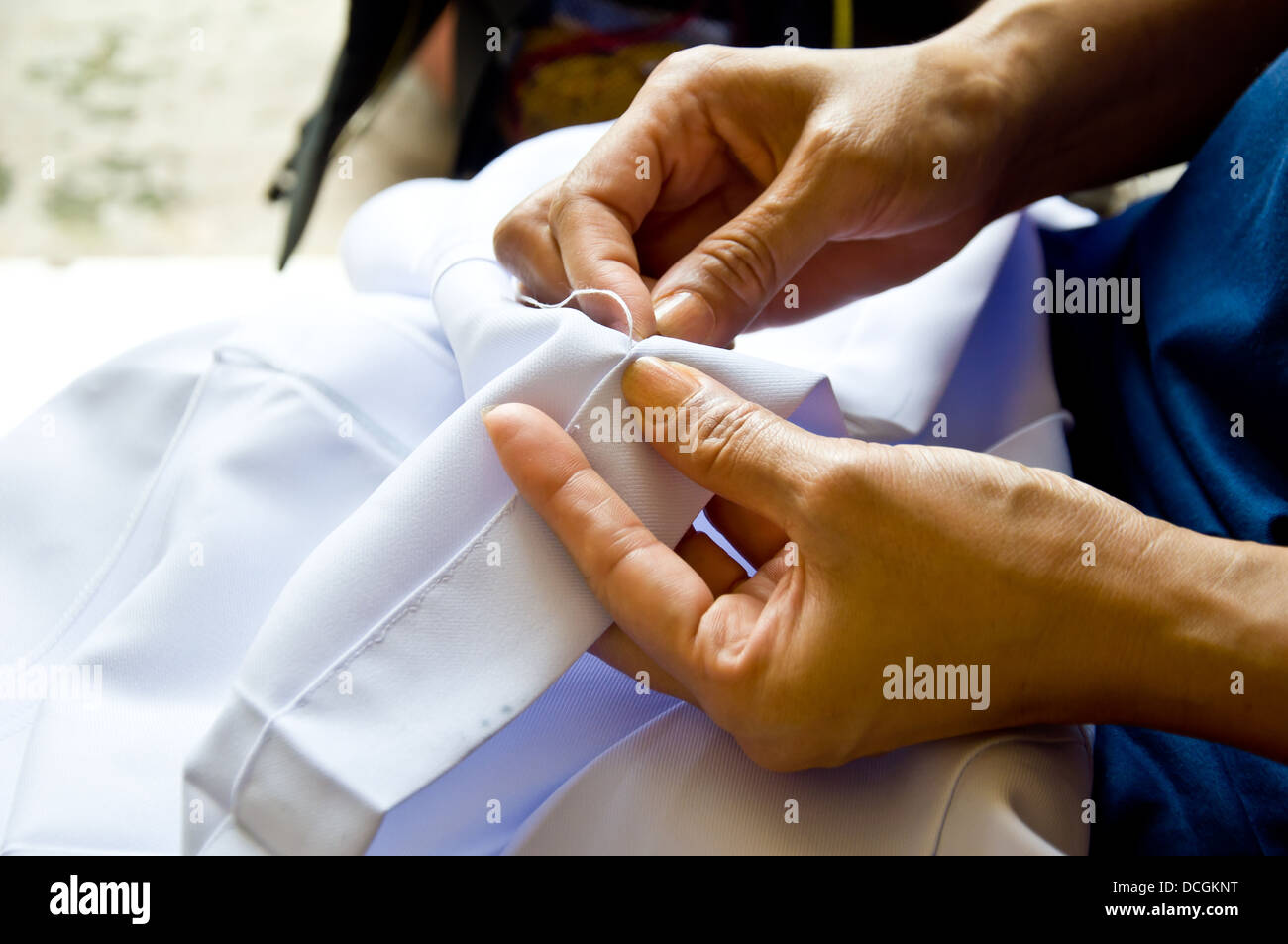 Hand sewing clothes hi-res stock photography and images - Alamy