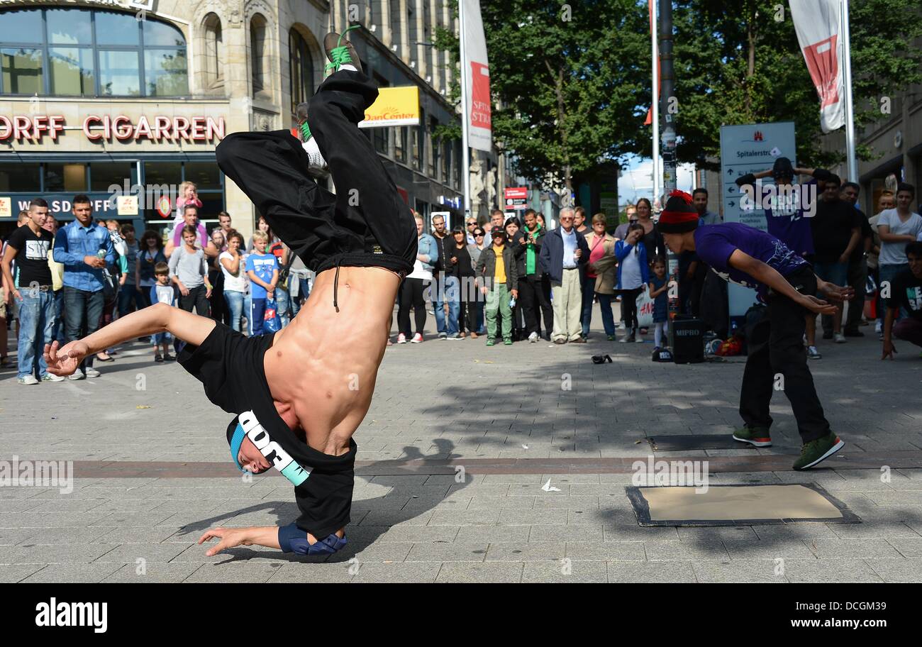 downtown Hamburg, Germany. 17th Aug, 2013. A breakdancer dances in ...