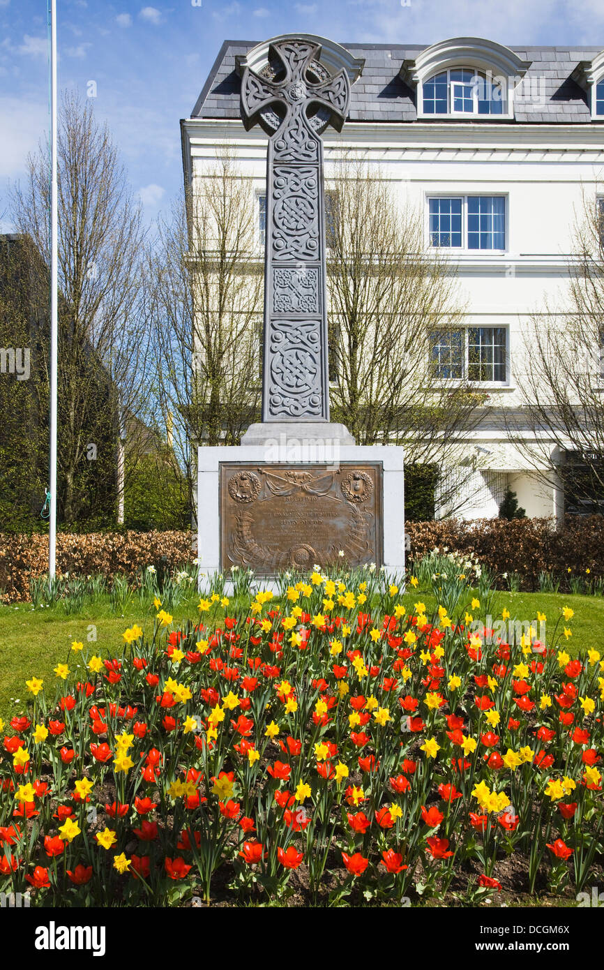 A Monument With A Cross In Front Of A Building; Killarney, County Kerry ...
