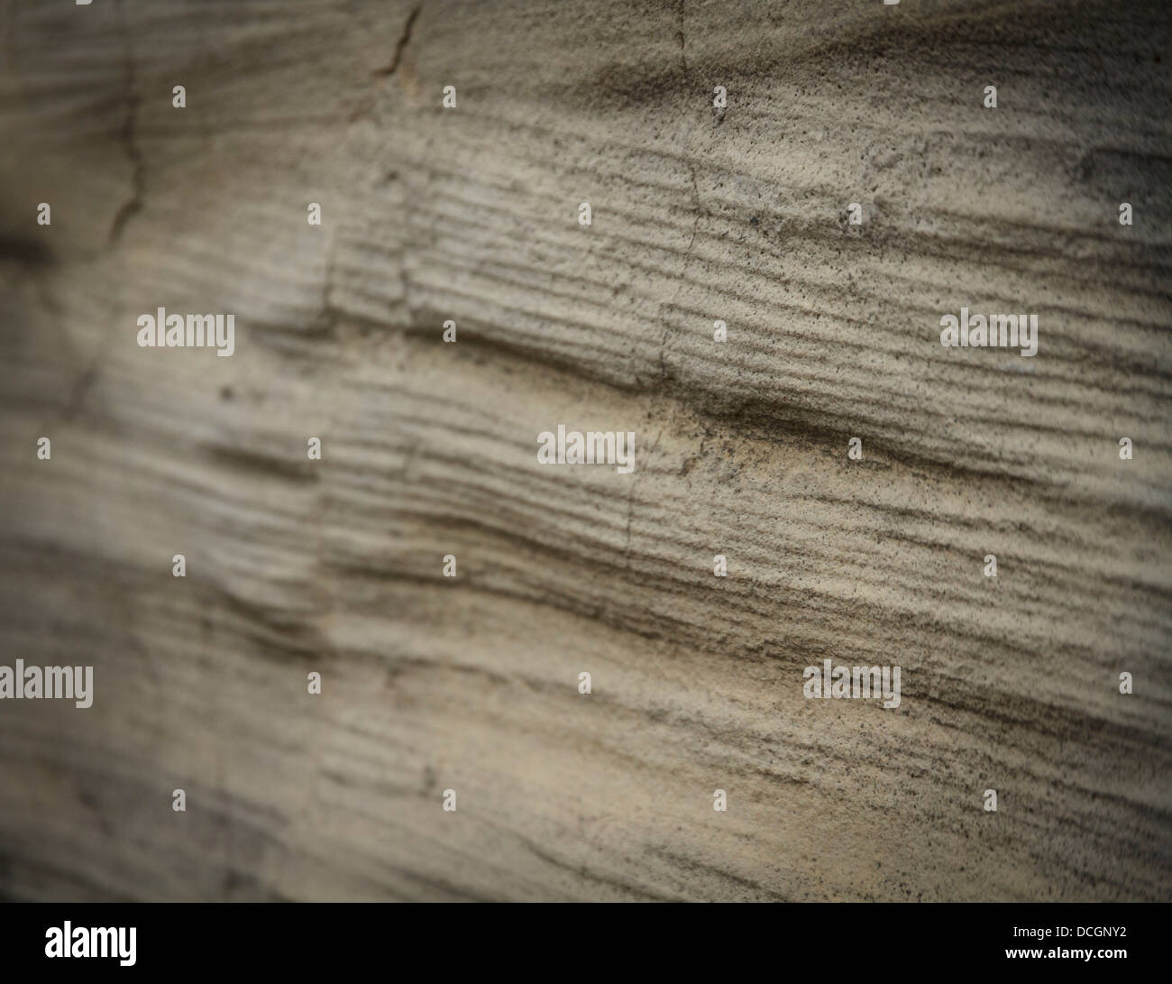 The weathered weather beaten eroded cracked sandstone granite stone ...