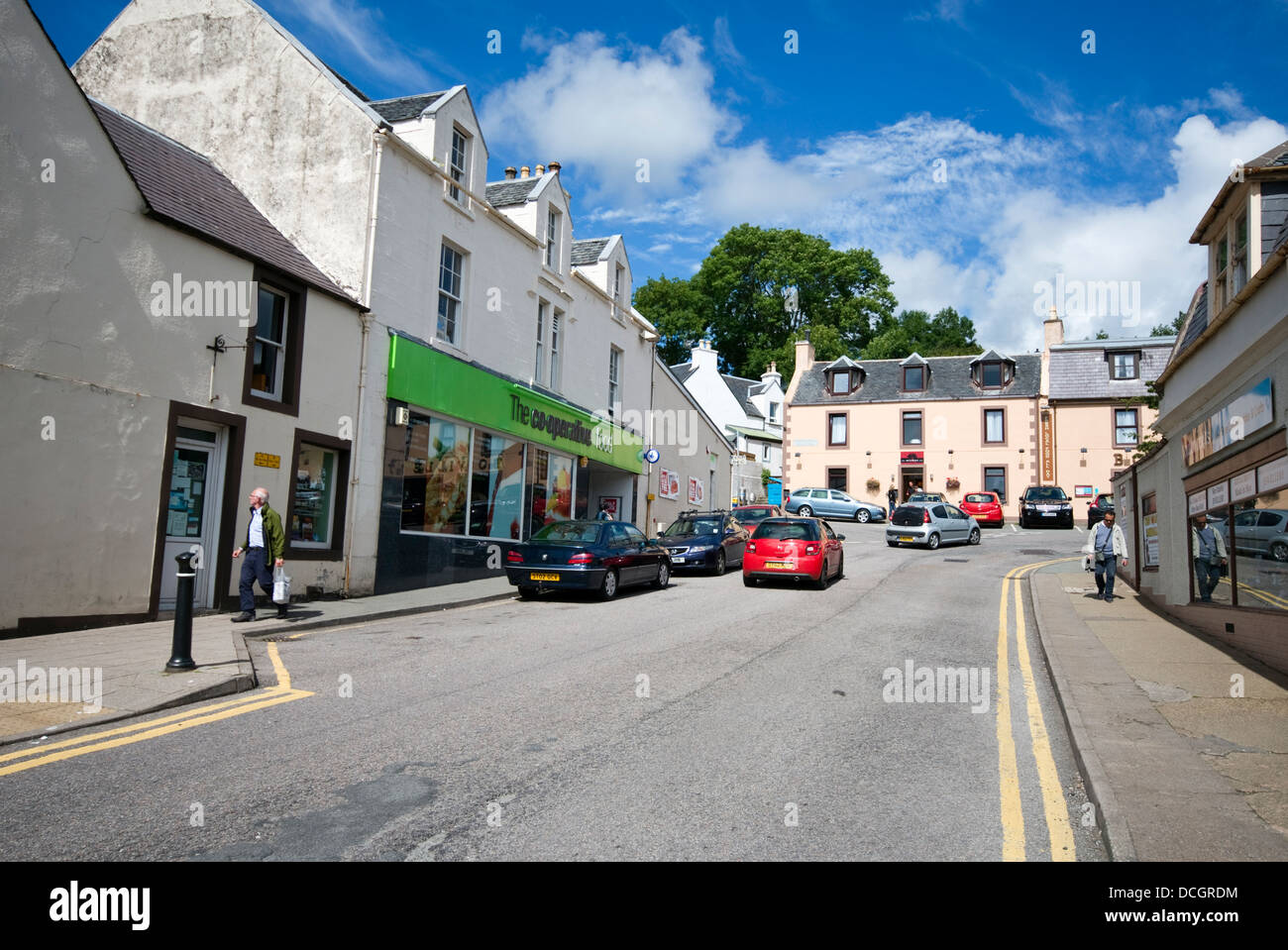 The main road through the town centre of Portree on the Isle of Skye ...