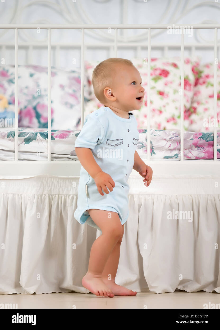 Fun baby in the nursery Stock Photo - Alamy