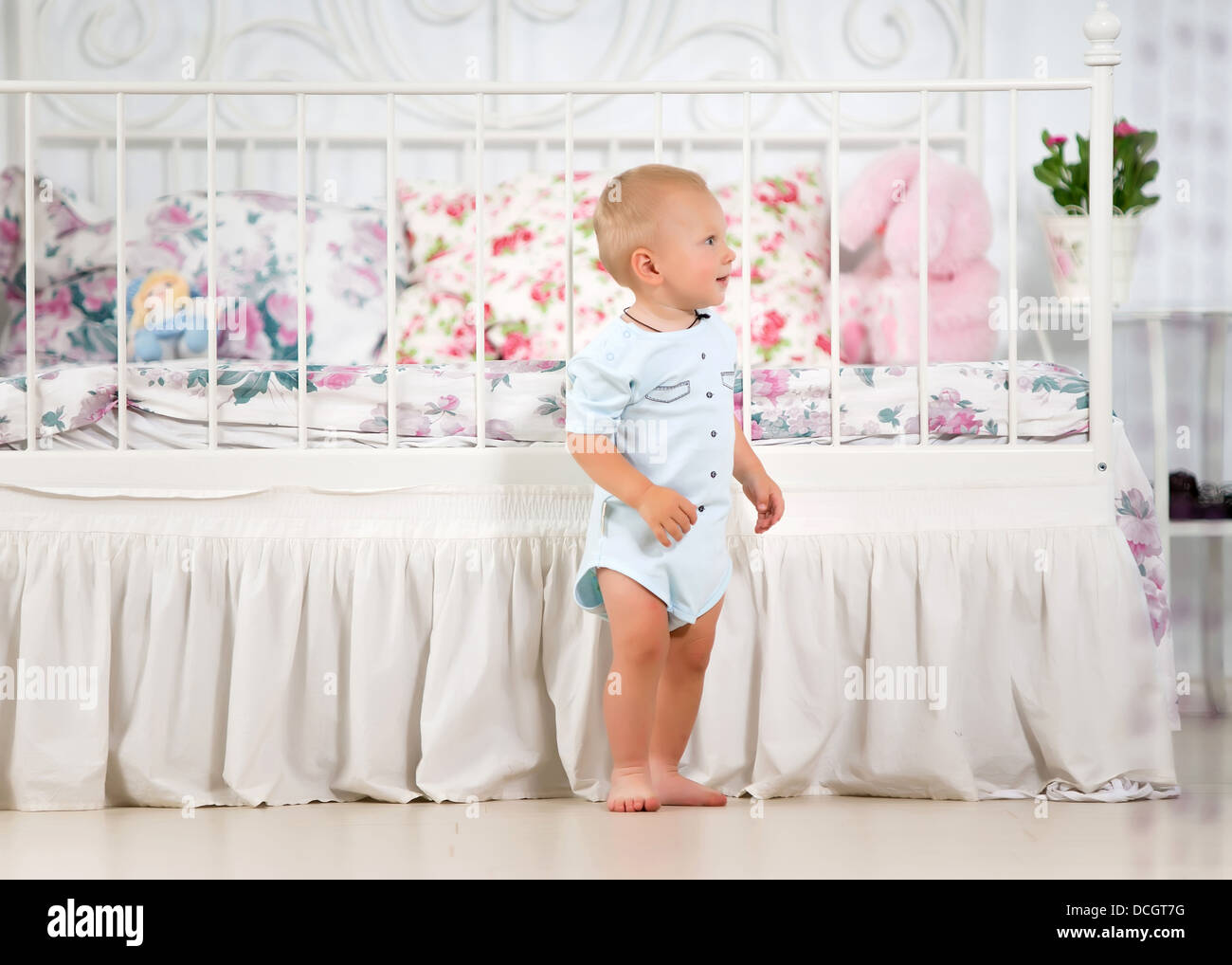 Fun baby in the nursery Stock Photo - Alamy