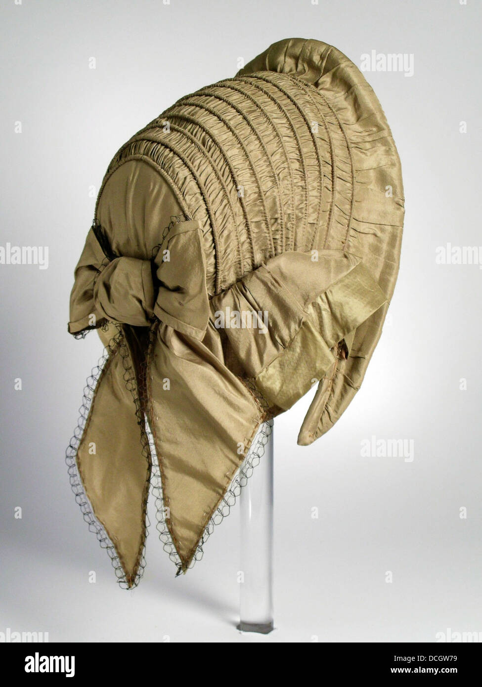 The woman's capote bonnet is a historic piece from the LACMA collection ...