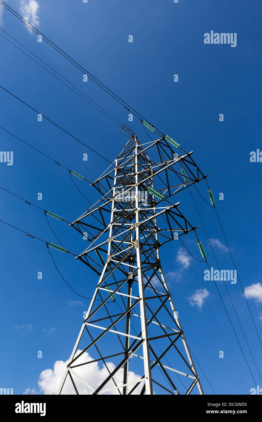Vertical image of high voltage tower with blue sky background Stock ...