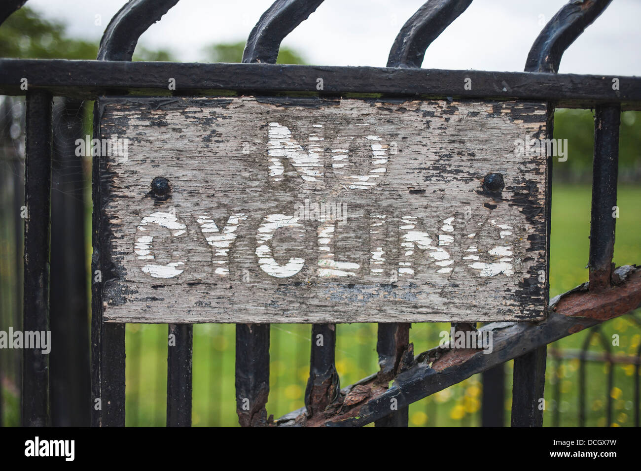 No Cycling wooden sign on gate Stock Photo - Alamy