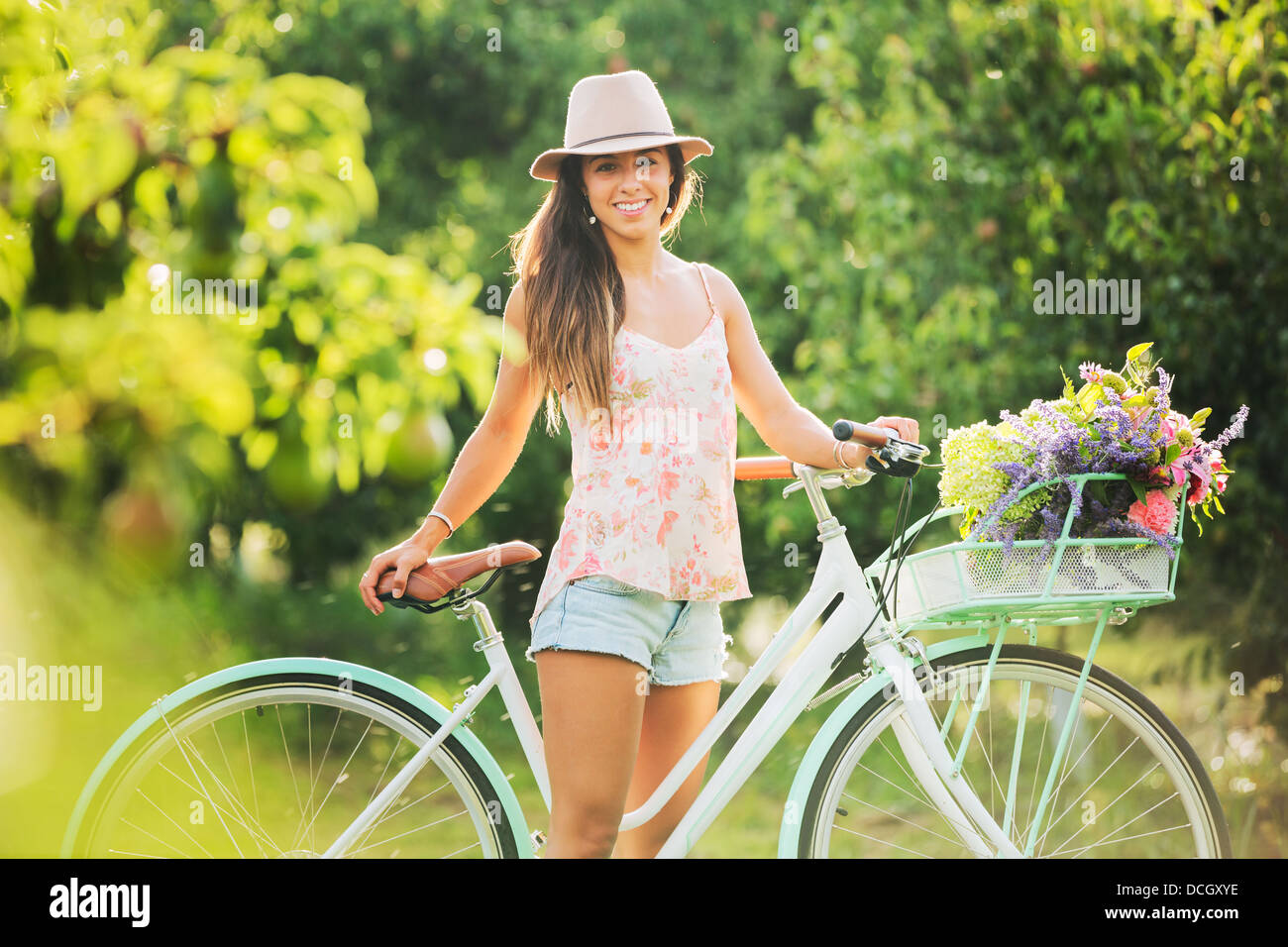 Beautiful Girl on Bike in Countryside, Summer Lifestyle Stock Photo - Alamy
