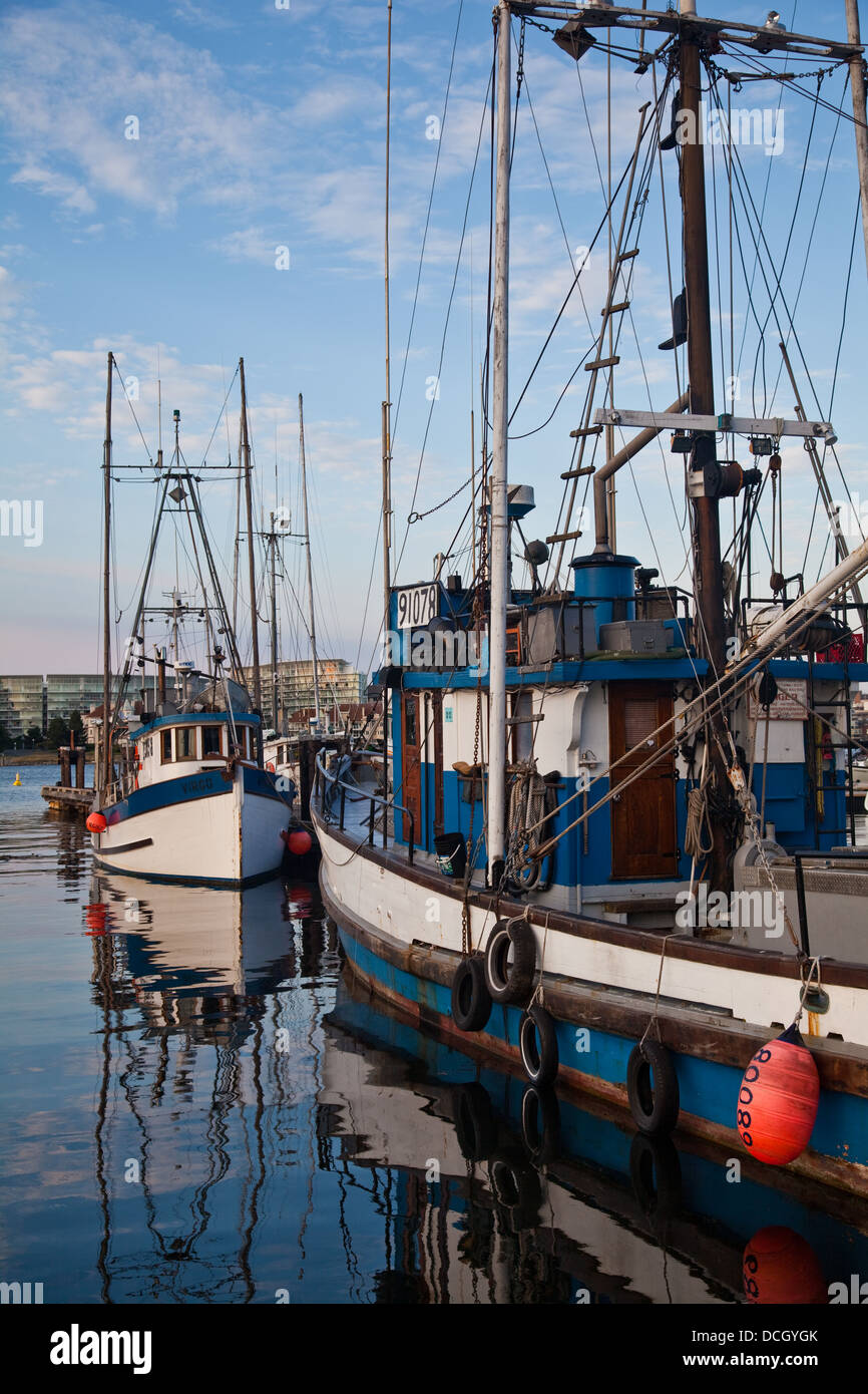 Commercial fishing boats docked at a wharf in Victoria, British ...
