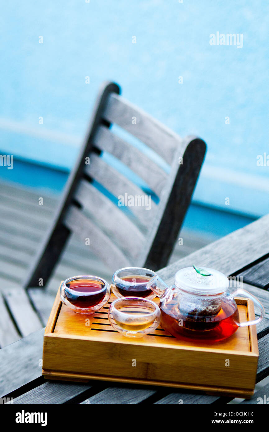 A chair and a tea set closeup Stock Photo - Alamy