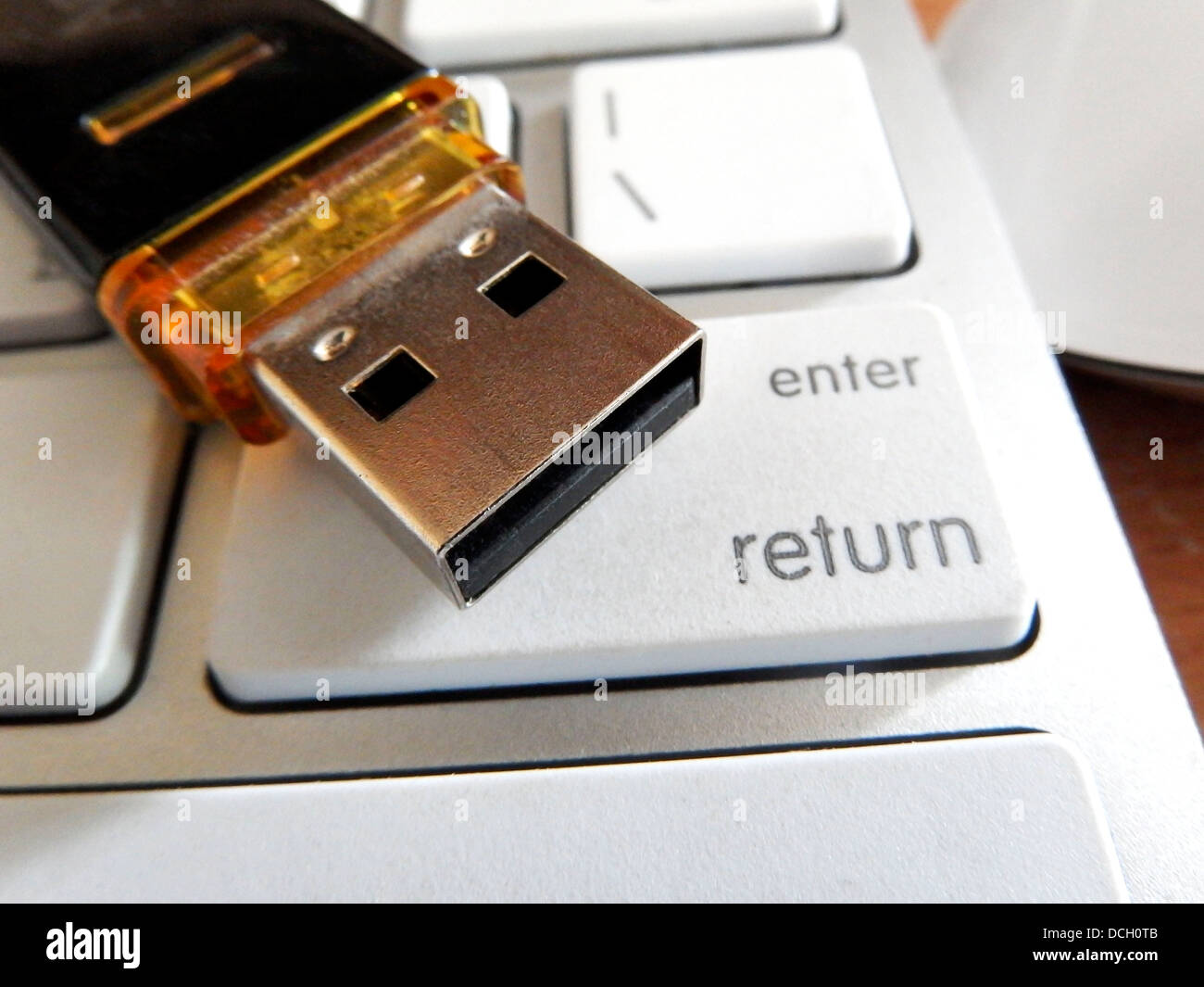 Flash drive on keyboard buttons Stock Photo - Alamy