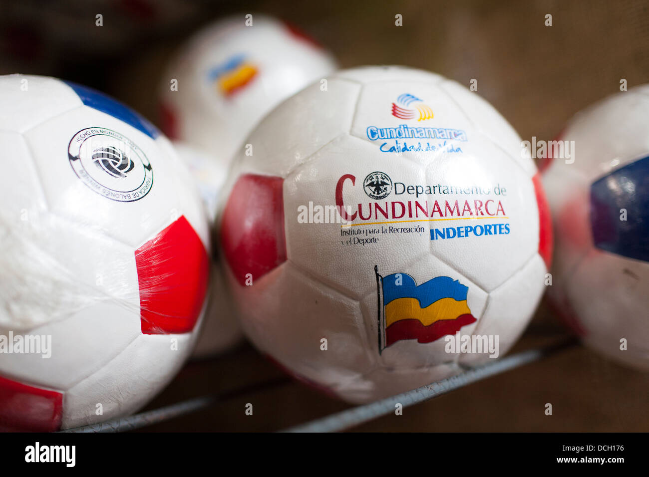 Hand made footballs on display for sale in a small football factory in ...
