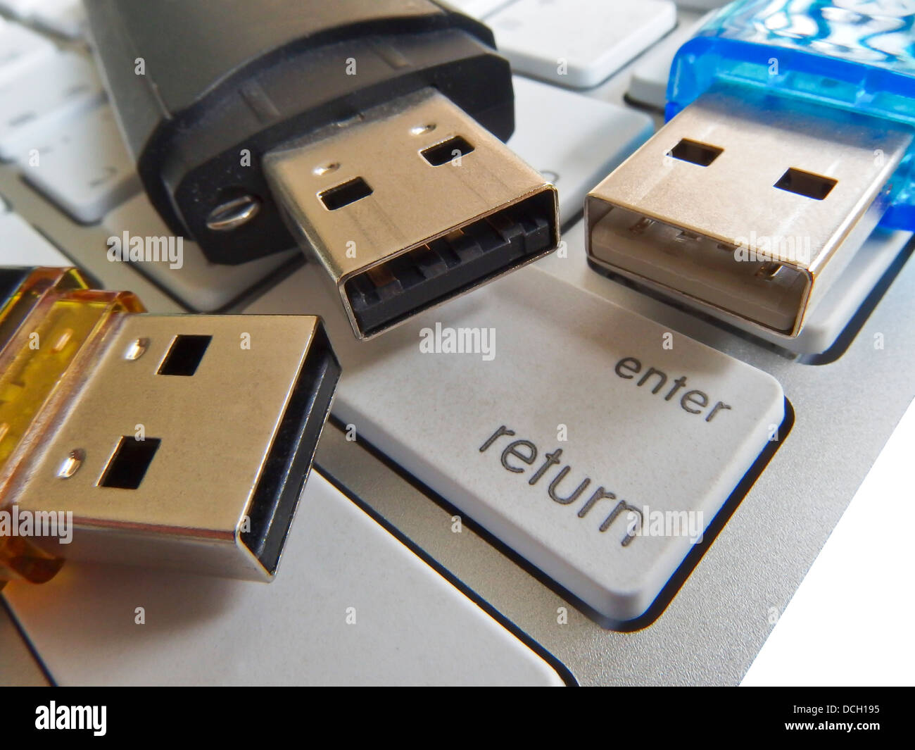 Flash drive on keyboard buttons Stock Photo - Alamy