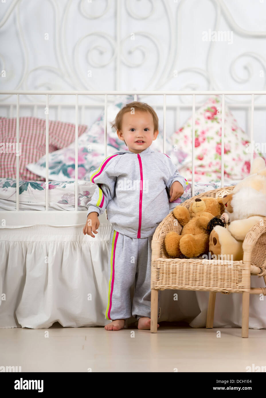 Fun baby in the nursery Stock Photo - Alamy