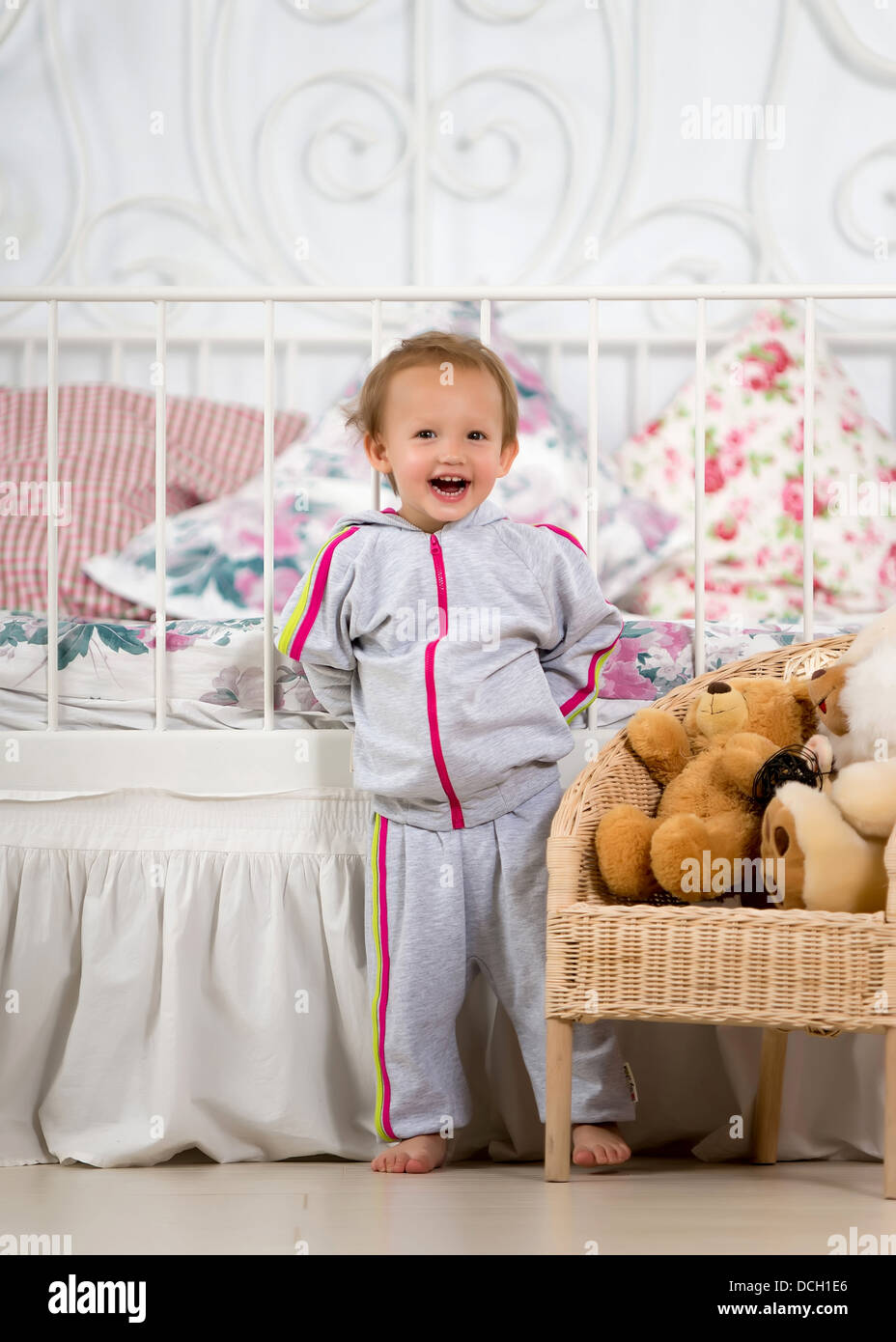 Fun baby in the nursery Stock Photo - Alamy