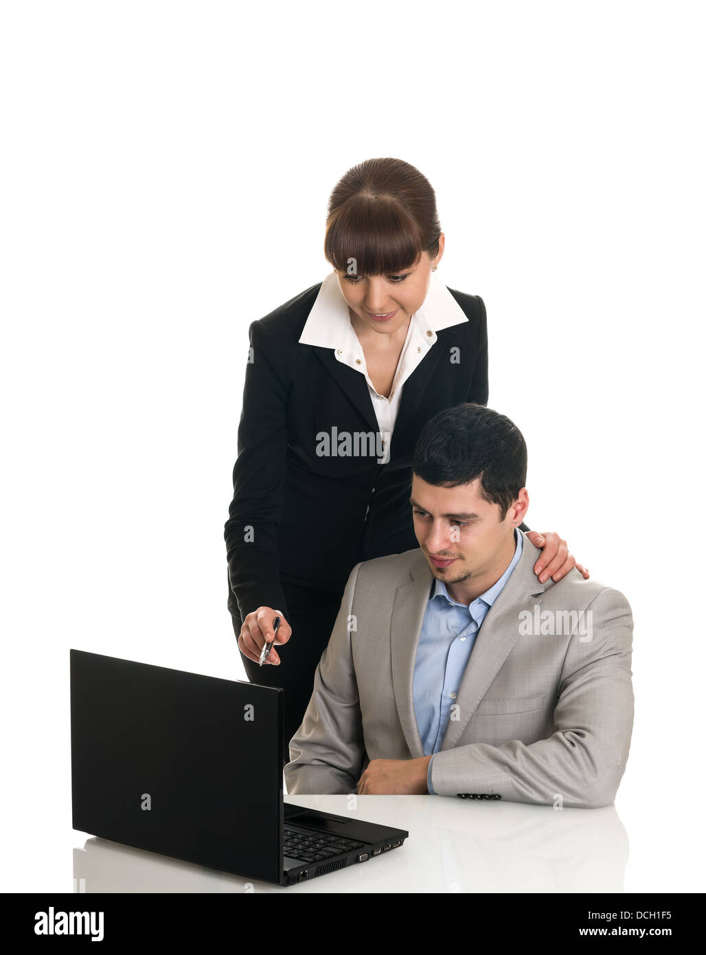 Two business people looking documents Stock Photo - Alamy