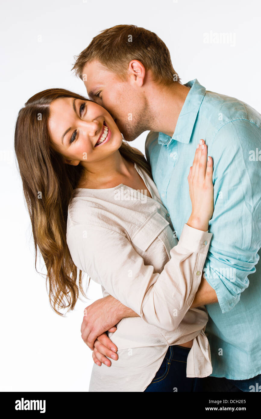 Lovely attractive couple together, studio shot, white background Stock ...
