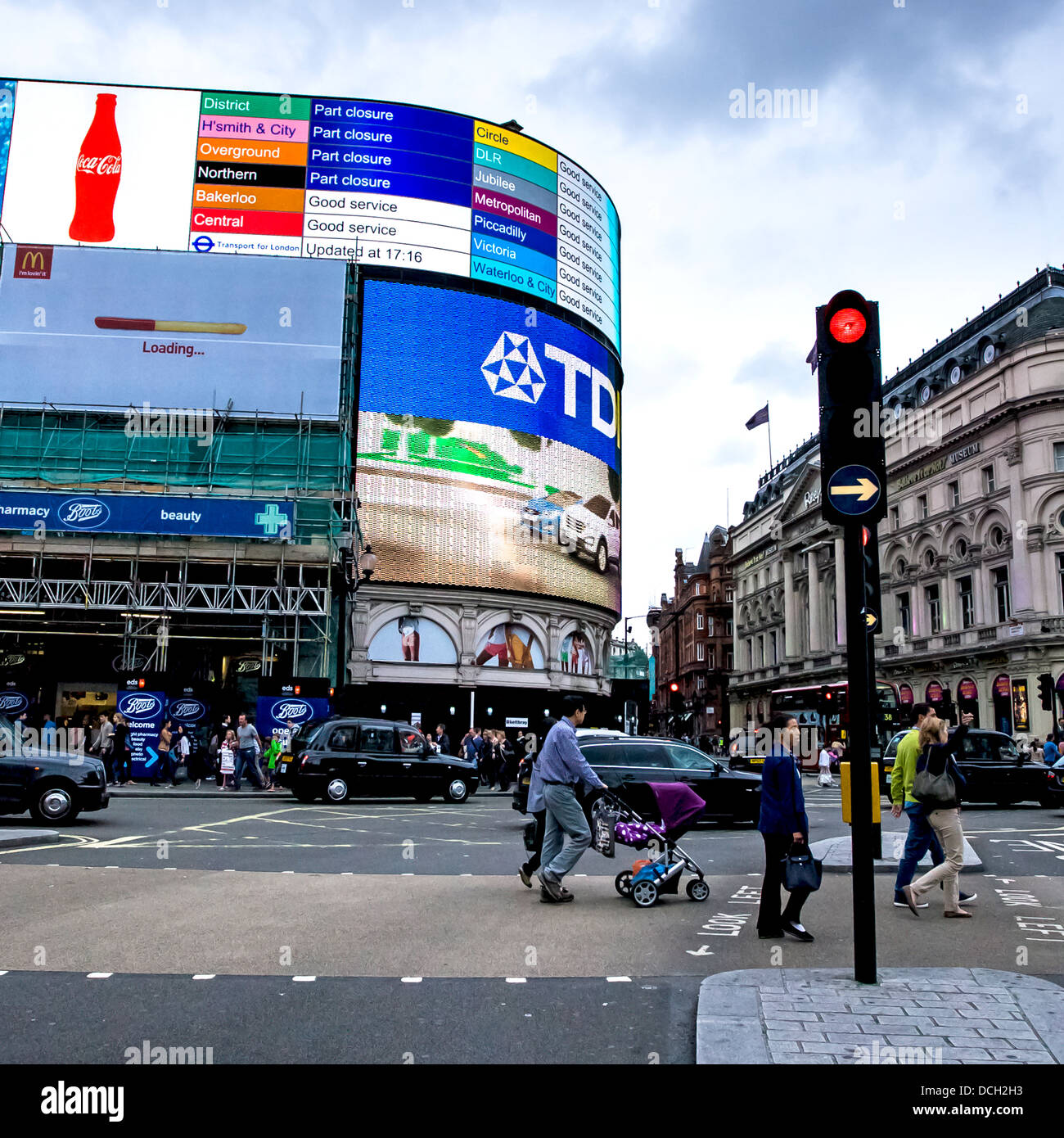 Traffic Lights in Piccadilly Circus with People Crossing Stock Photo ...