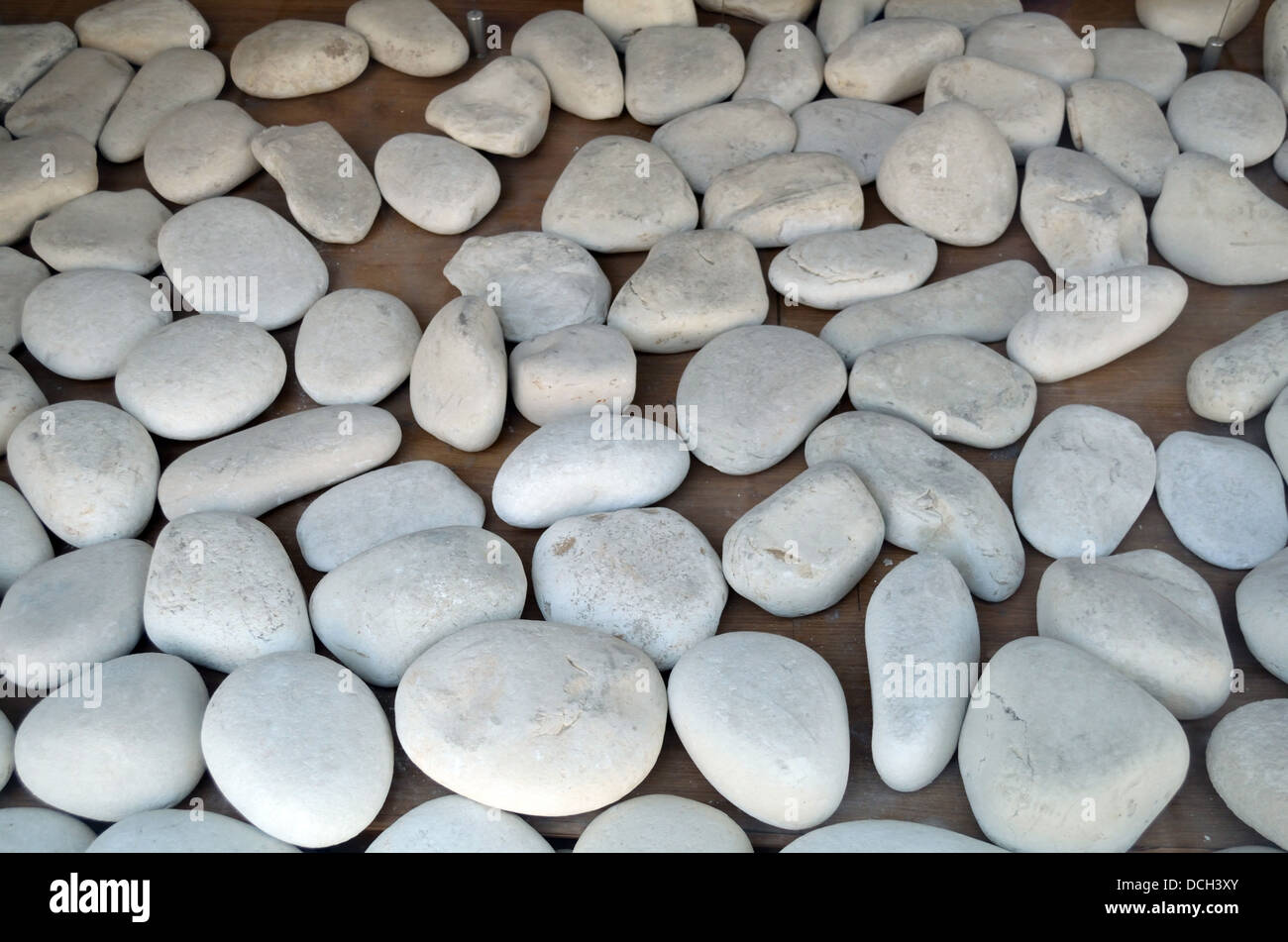 Sea stones background Stock Photo - Alamy