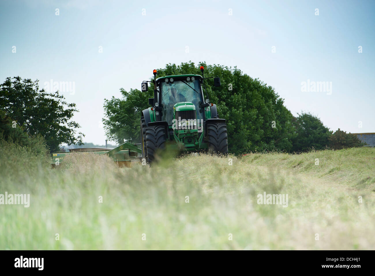 Contermporary hay making Stock Photo - Alamy