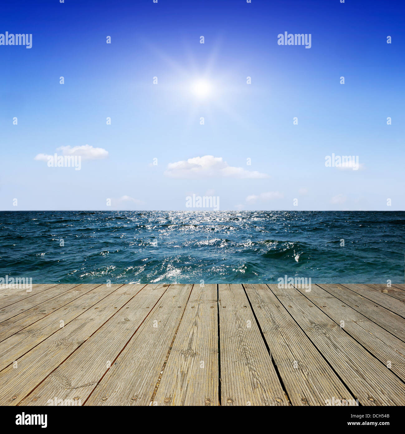 Blue ocean and blue sky with sun Stock Photo - Alamy