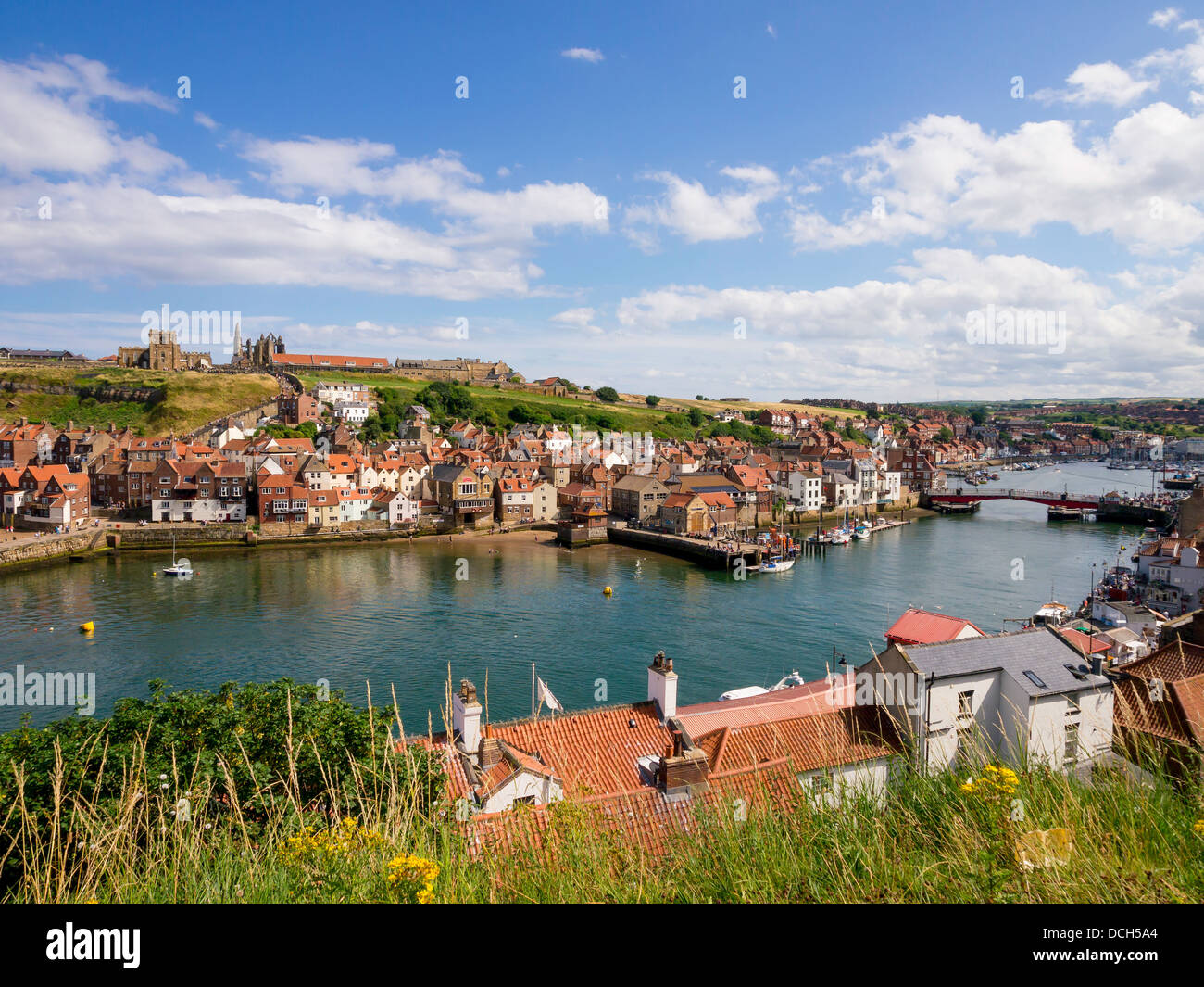 Whitby harbour with St Mary's church, the Abbey and cottages on the ...