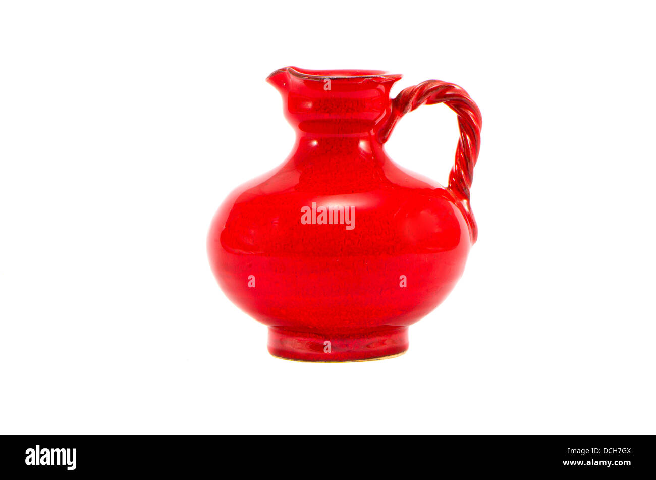 red beautiful ceramic jug isolated on white background Stock Photo - Alamy