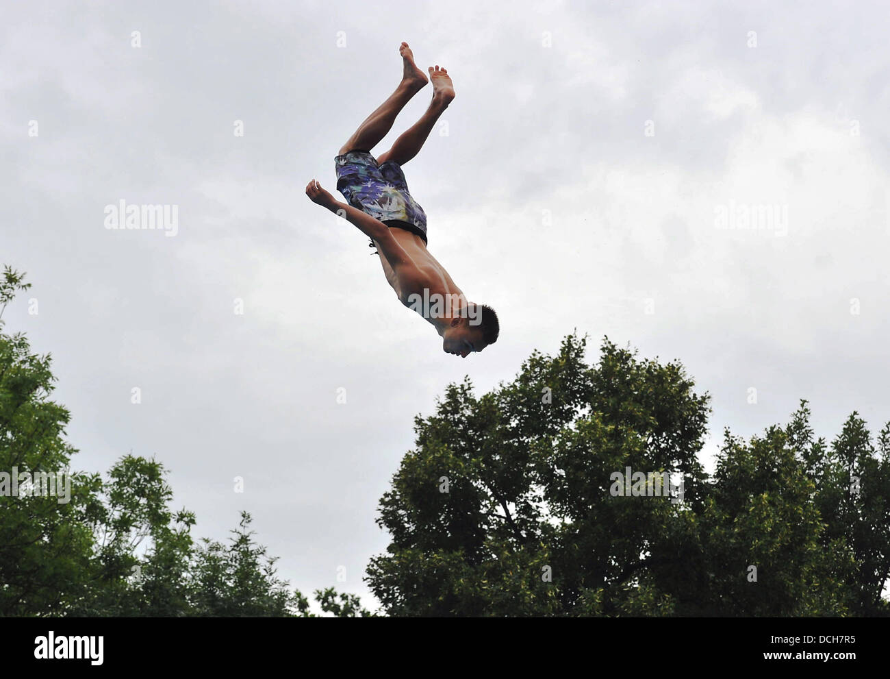 A splashdiverjumps off a 10 m diving platform during the Splashdiving ...
