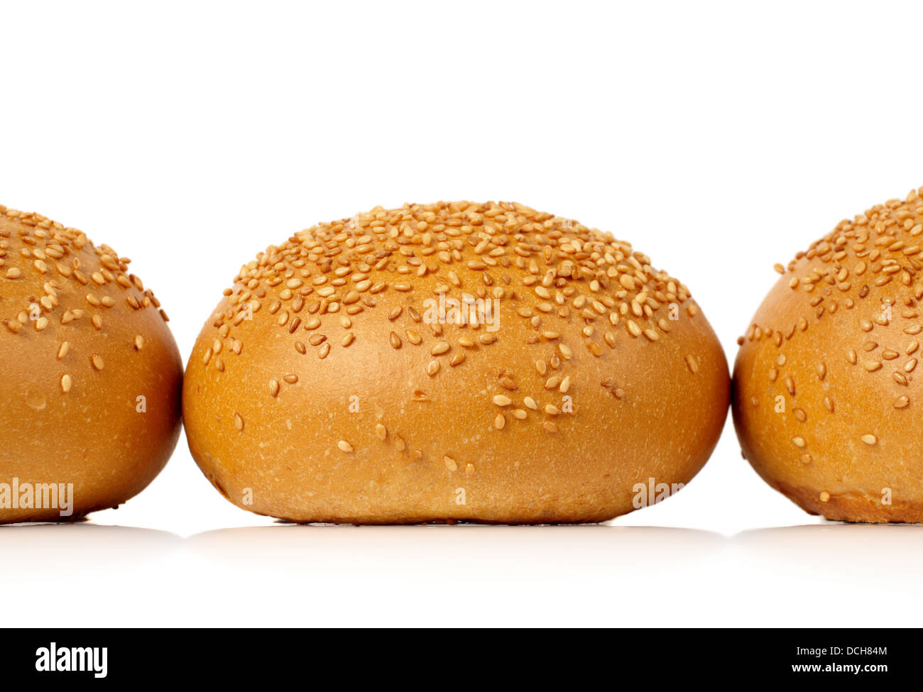 Three oval buns isolated over white background Stock Photo - Alamy