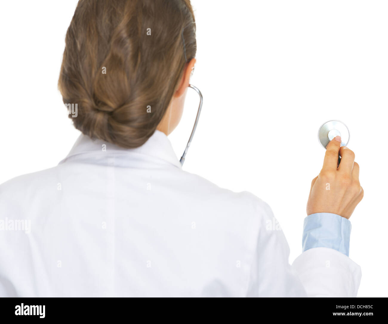 Doctor woman using stethoscope . rear view Stock Photo - Alamy
