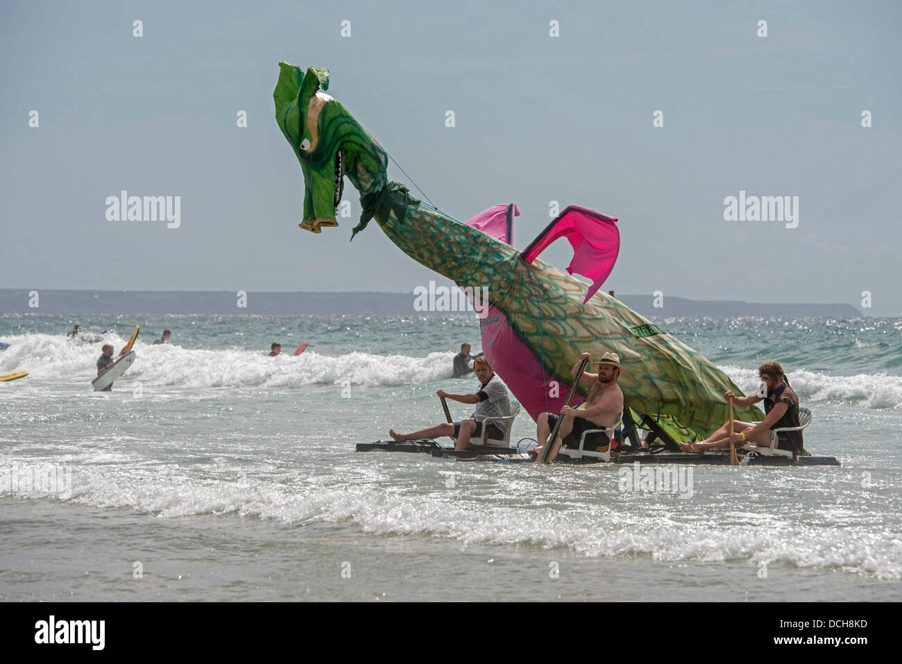 Cornwall, UK, 18th August 2013. The Dragon raft completes the course ...