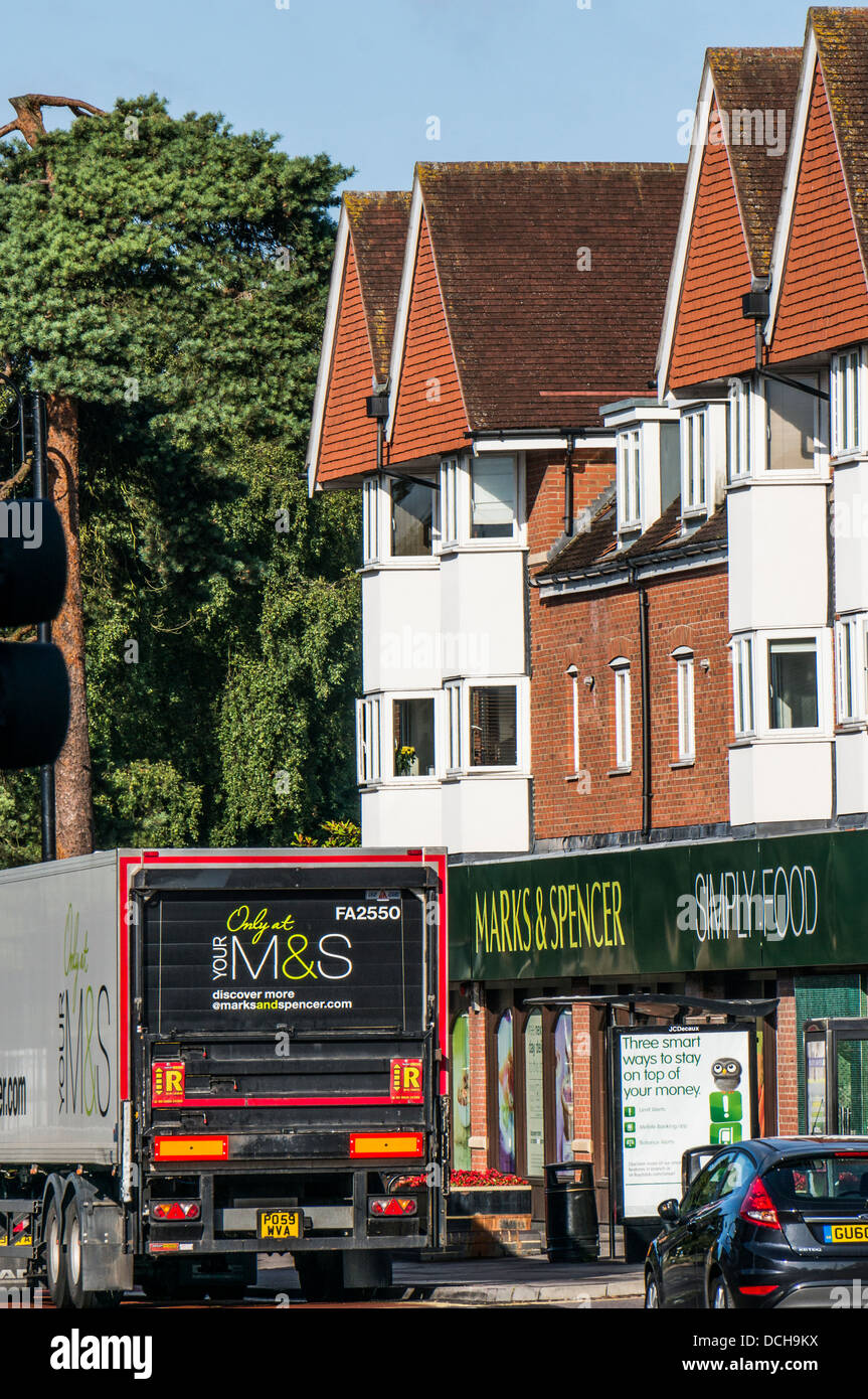 Marks and & Spencer (M&S) store / shop with a delivery van outside, on ...