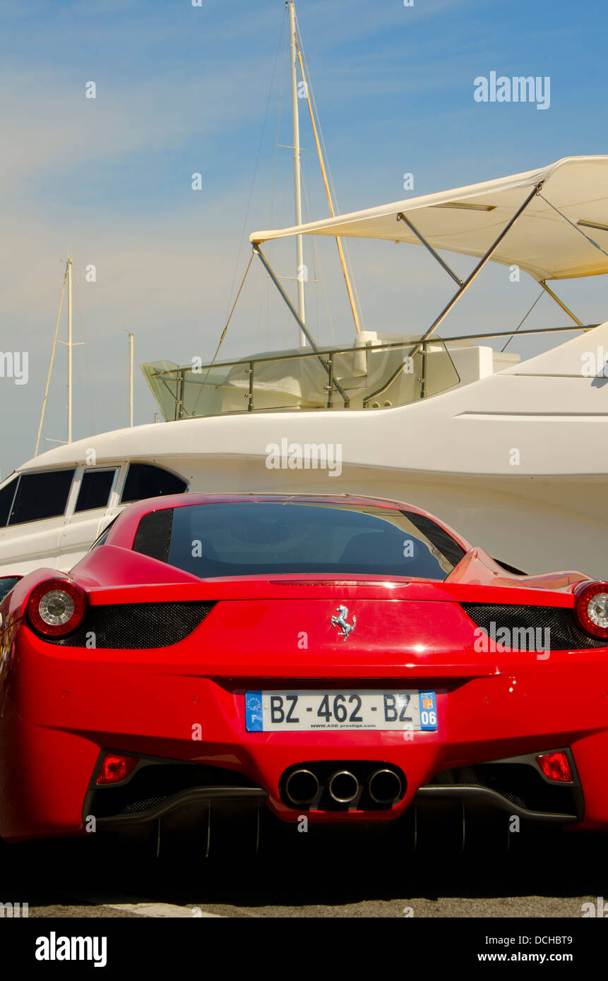 Ferrari 458 Italia parked in front of a yacht in Puerto banus, Marbella ...