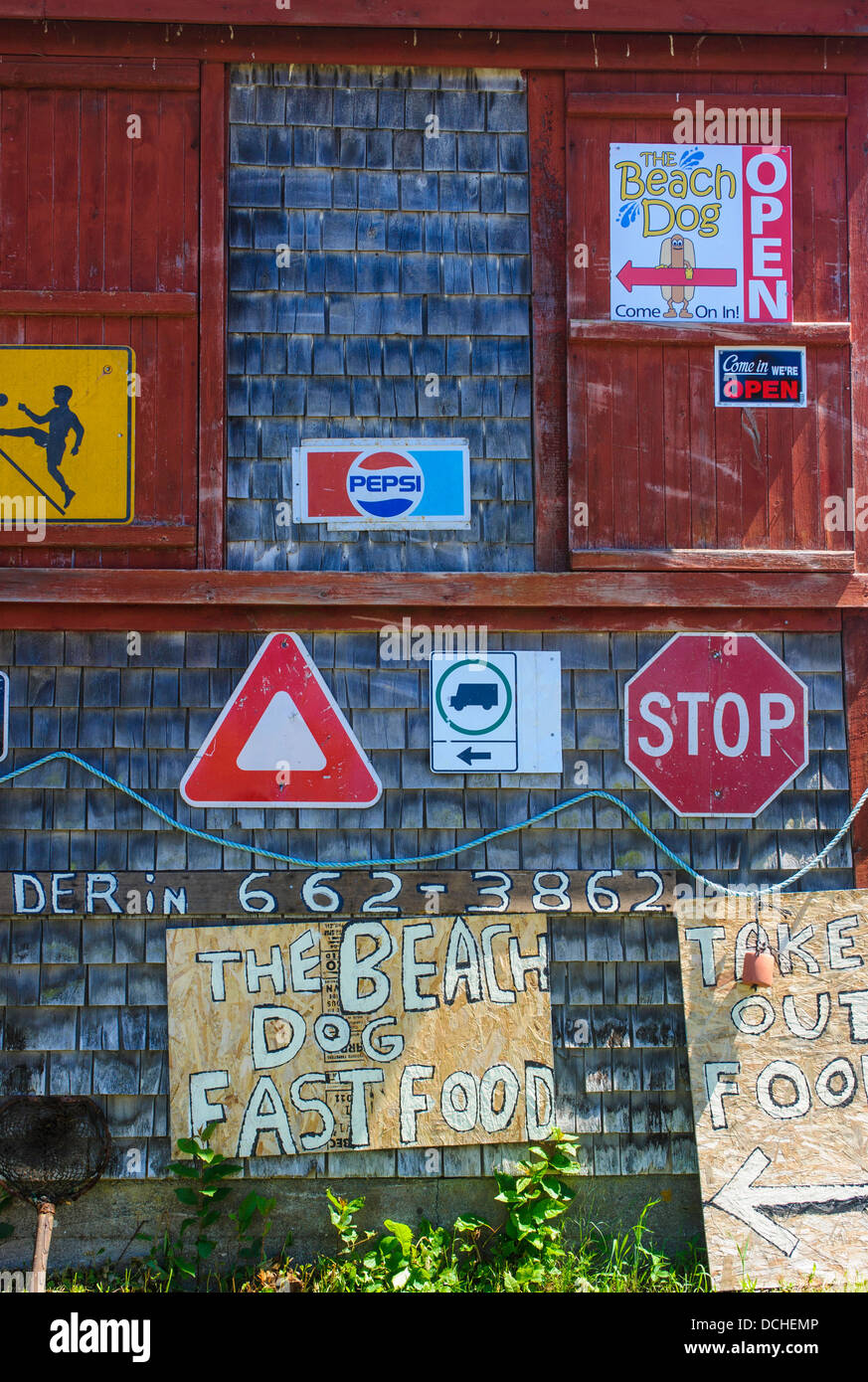 Old signs on smoke house Grand Manan Island Stock Photo - Alamy