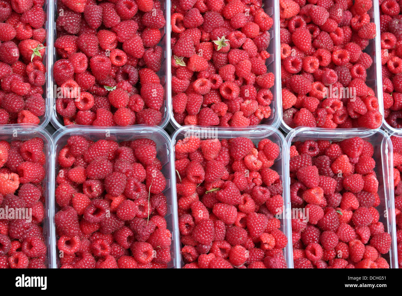 bunch of red ripe and tasty raspberry Stock Photo - Alamy