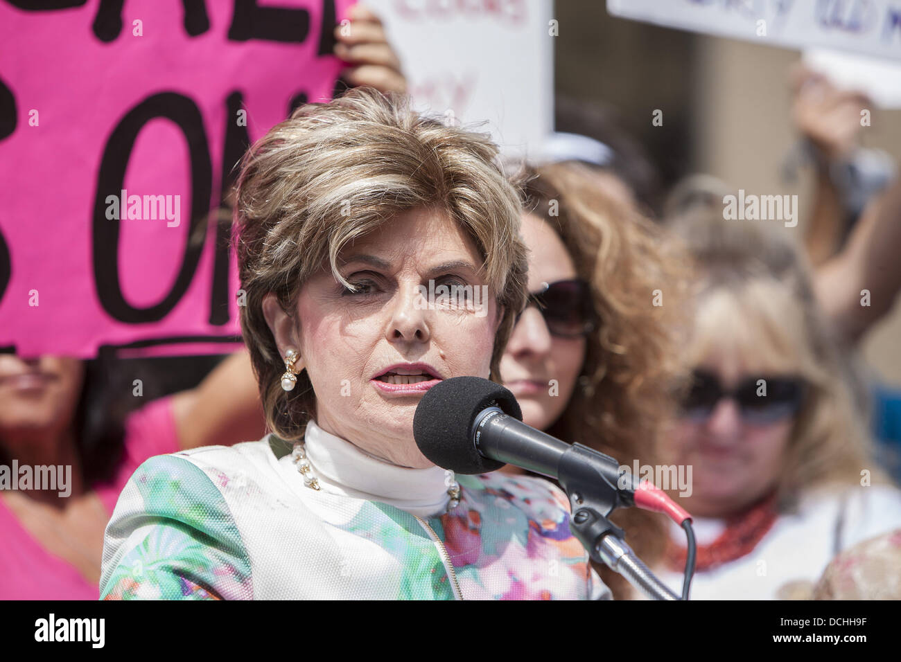 San Diego, California, USA. 18th Aug, 2013. Surrounded by several ...