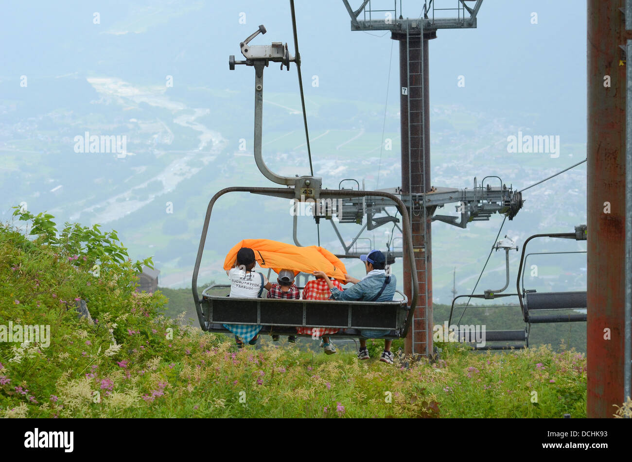 Getting wet on chairlift hi-res stock photography and images - Alamy