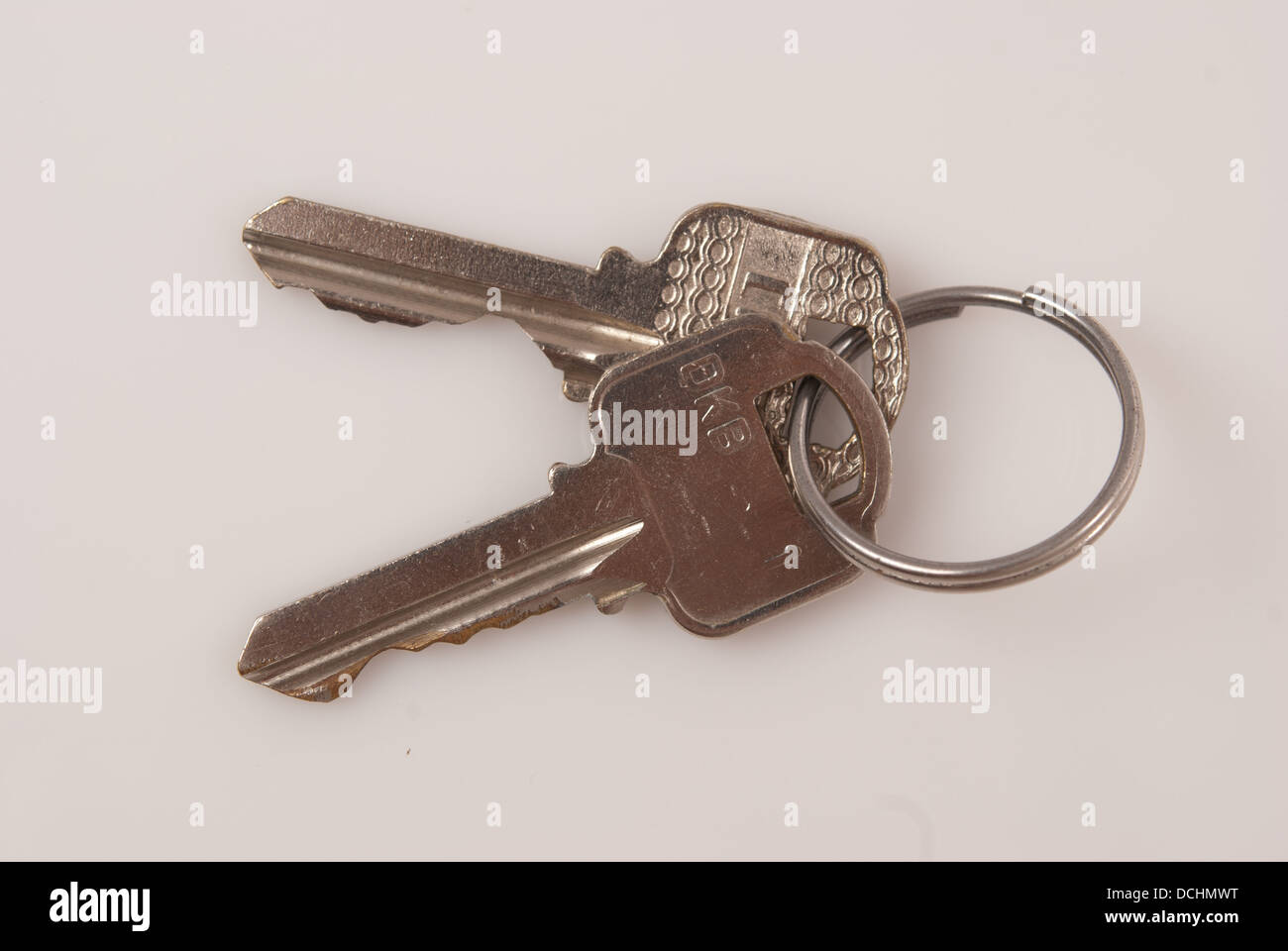 Key isolated on white background Stock Photo - Alamy