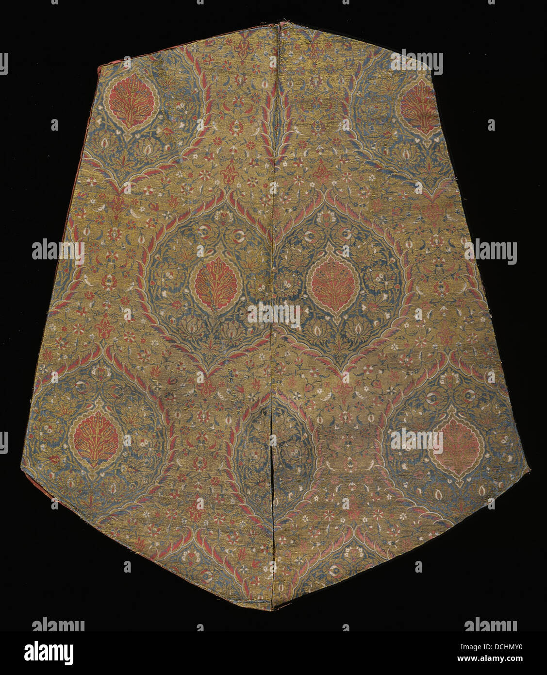 This textile features a design of staggered floral ogives, a decorative ...