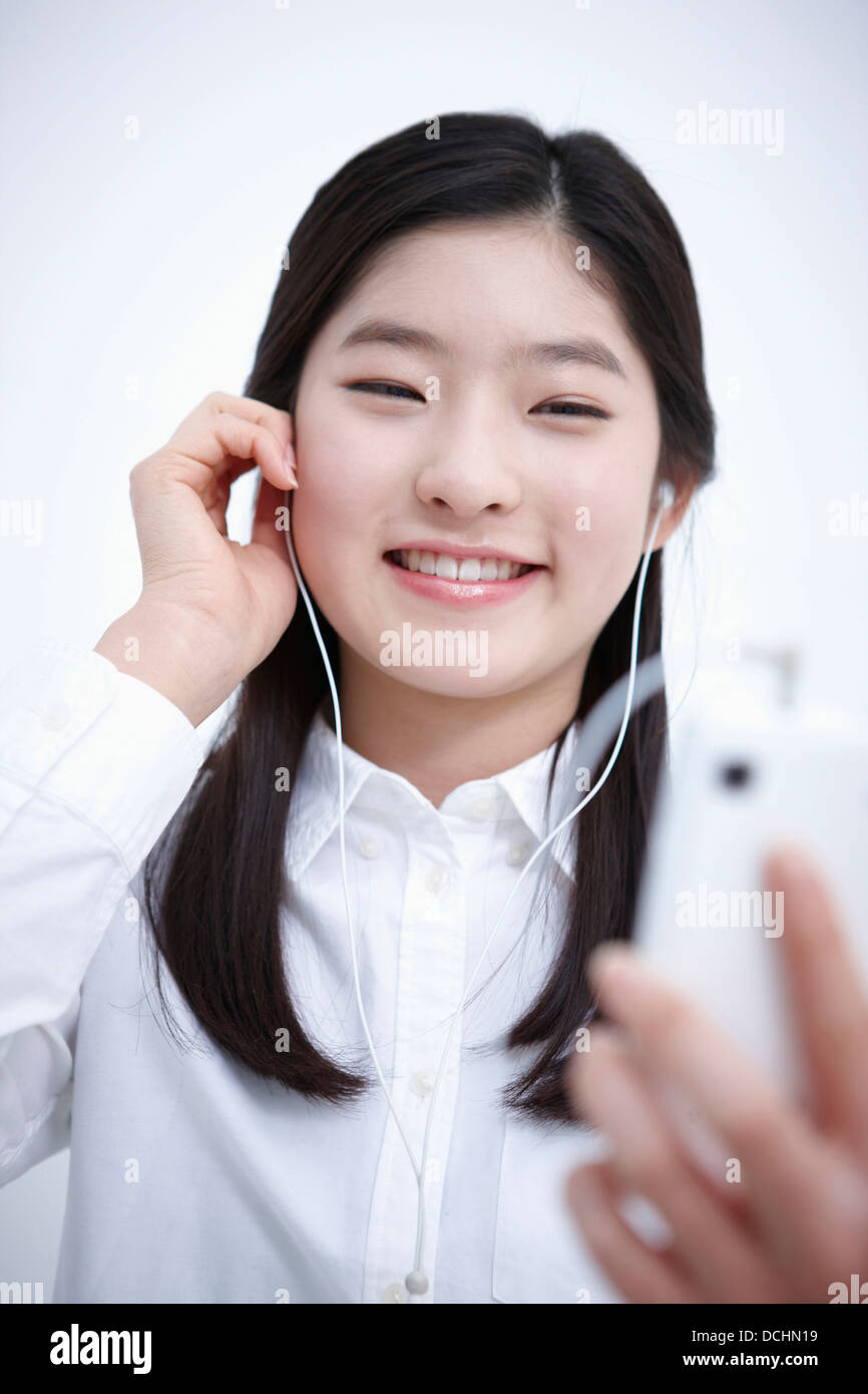 a student listening to music Stock Photo - Alamy